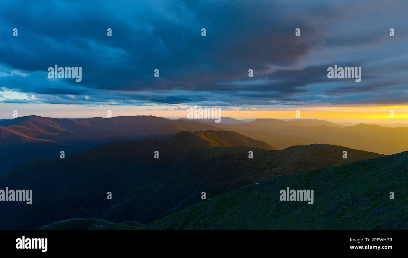 The beautiful Mount Feathertop during vibrant orange sunset in Australia Stock Photo - Alamy