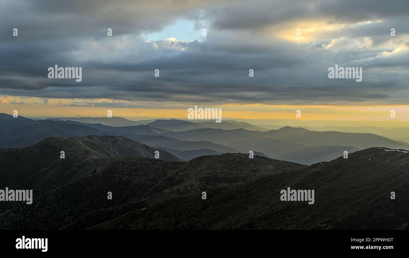 The beautiful Mount Feathertop during vibrant orange sunset in Australia Stock Photo - Alamy