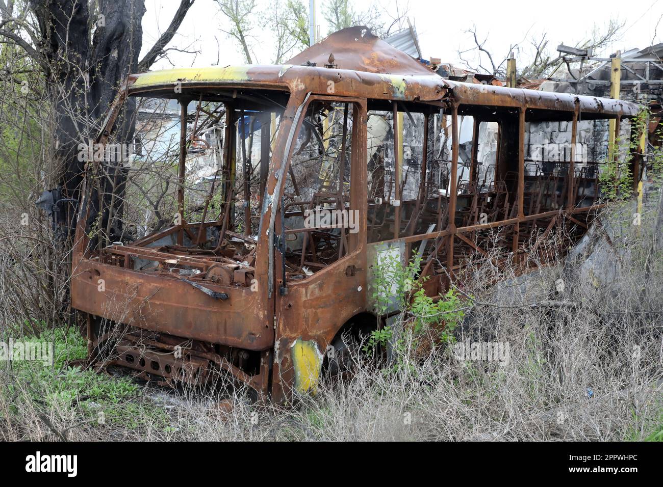KAMIANKA, UKRAINE - APRIL 22, 2023 - A burnt-out bus destroyed by ...