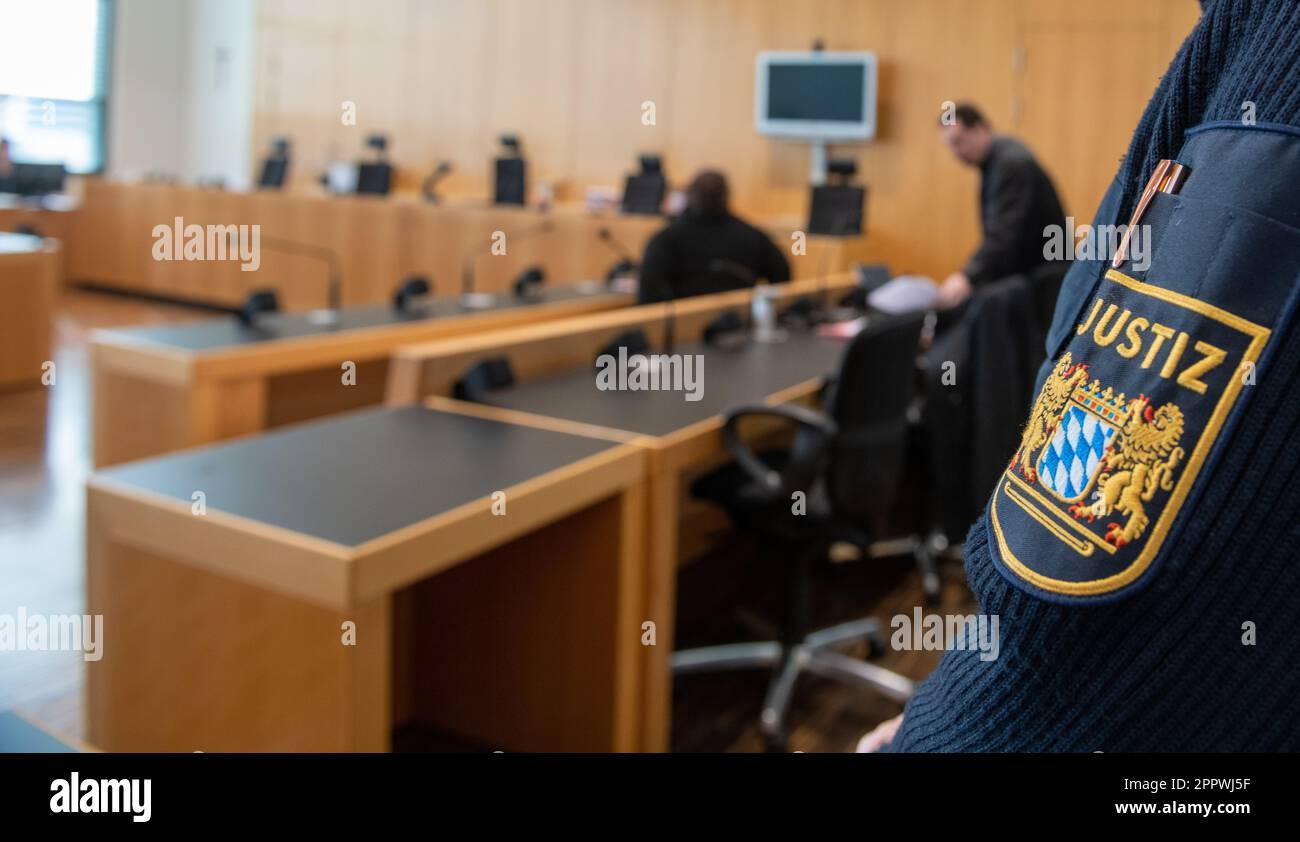 25 April 2023, Bavaria, Augsburg: A member of the judiciary stands at ...