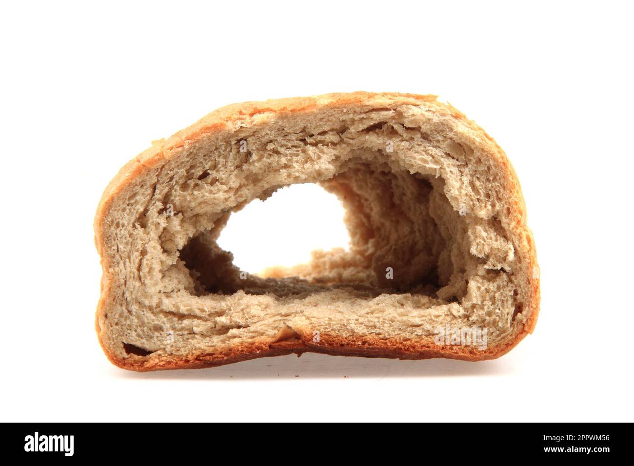 old dry bread with hole isolated on the white background Stock Photo ...