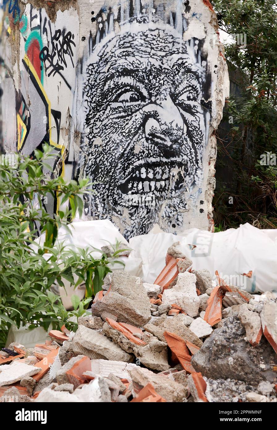 Rubbish dump with graffiti Stock Photo - Alamy