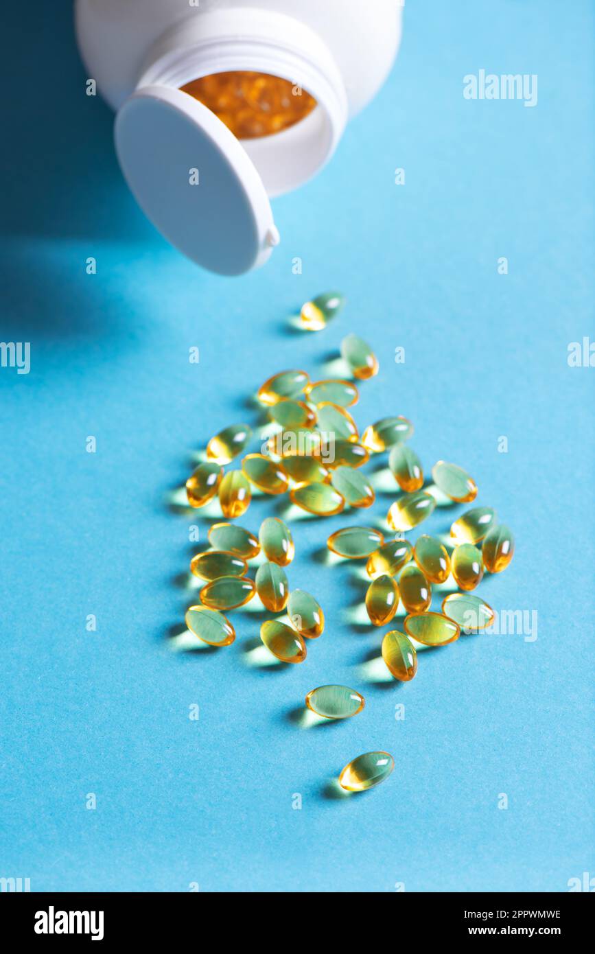 Oil filled capsules (softgel) of food supplements: fish oil, omega 3 ...