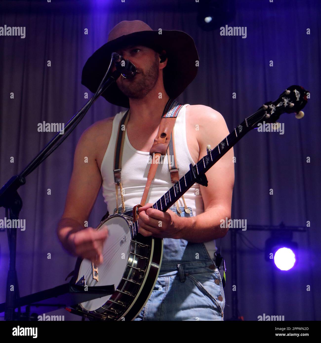 Steve N Seagulls banjo player and singer Herman on stage at the Byron ...