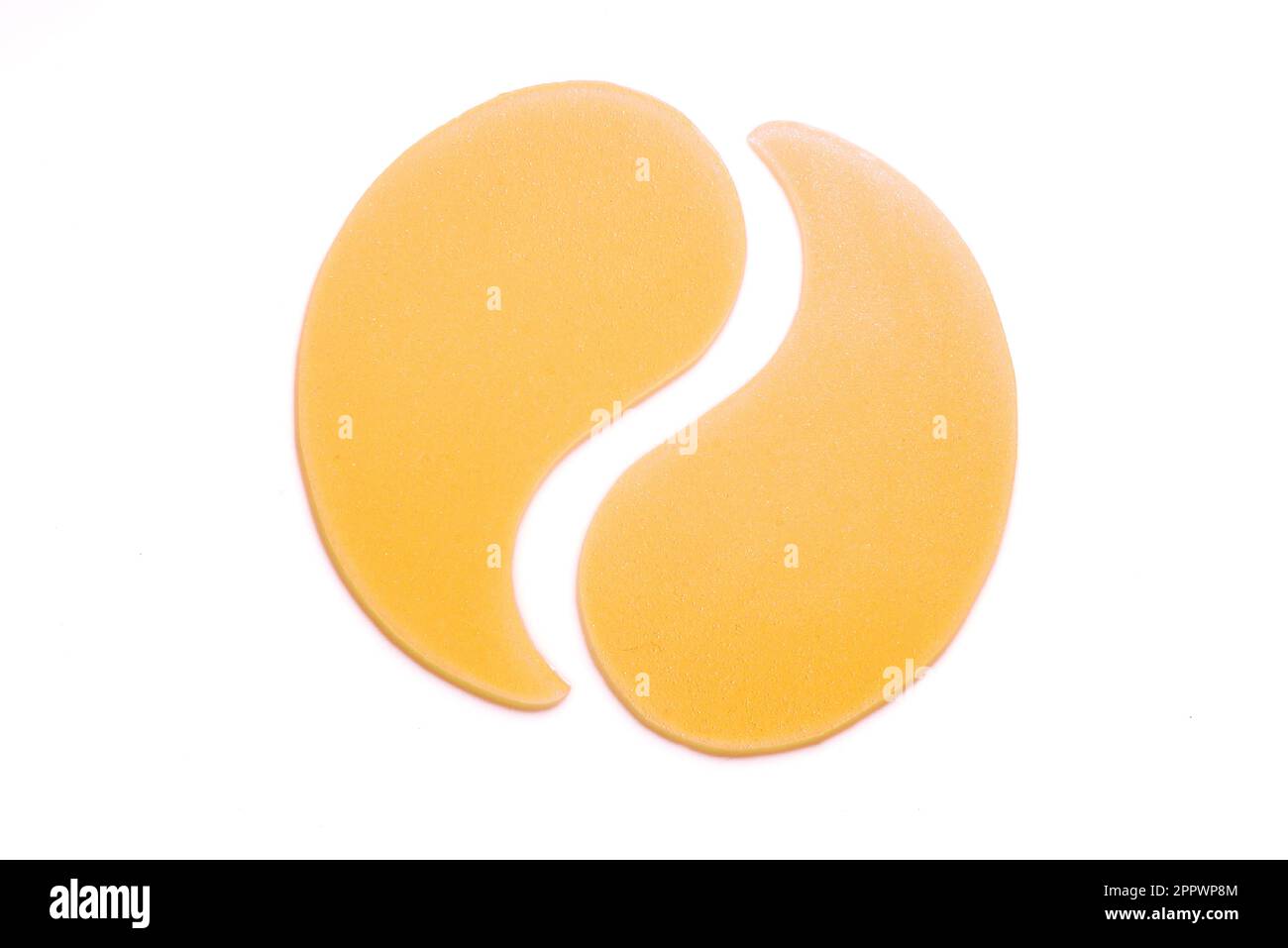 Hydrogel golden yellow eye patches isolated on white background ...