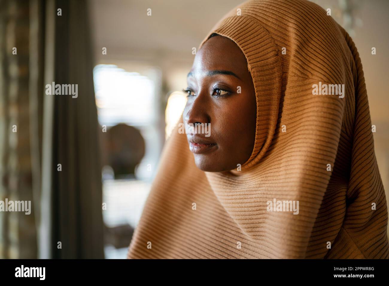 Portrait of beautiful young black african muslim woman wearing ...