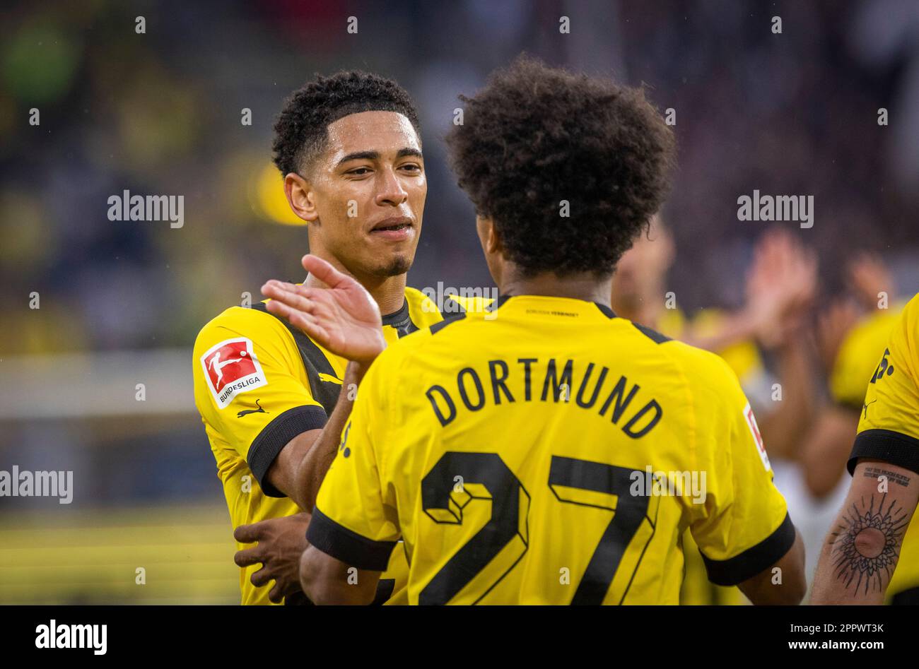 Dortmund, Germany. 22nd Apr, 2023. Karim Adeyemi (BVB) bekommt von Jude ...