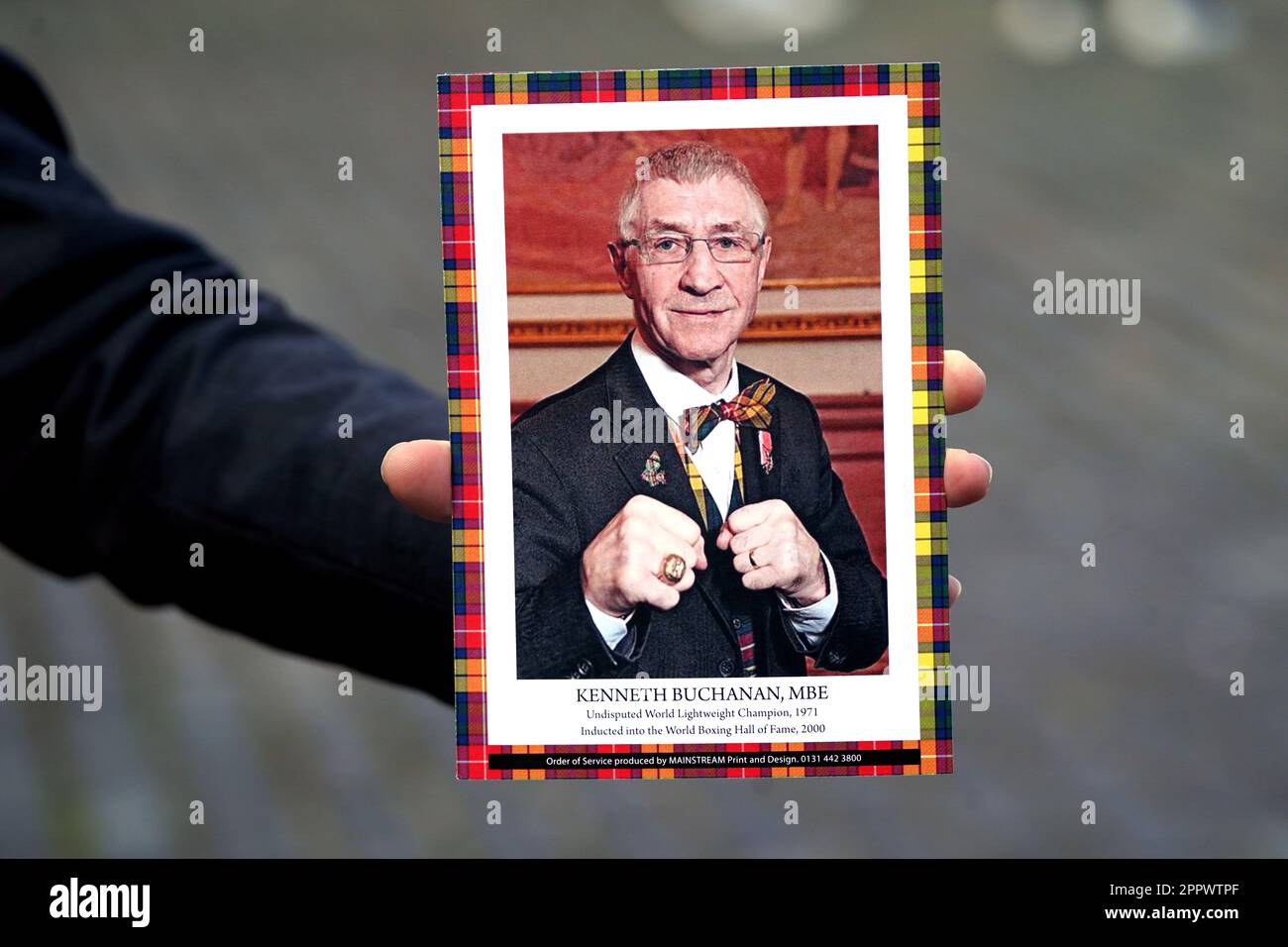 The Order of Service, featuring a picture of Ken Buchanan, ahead of a ...