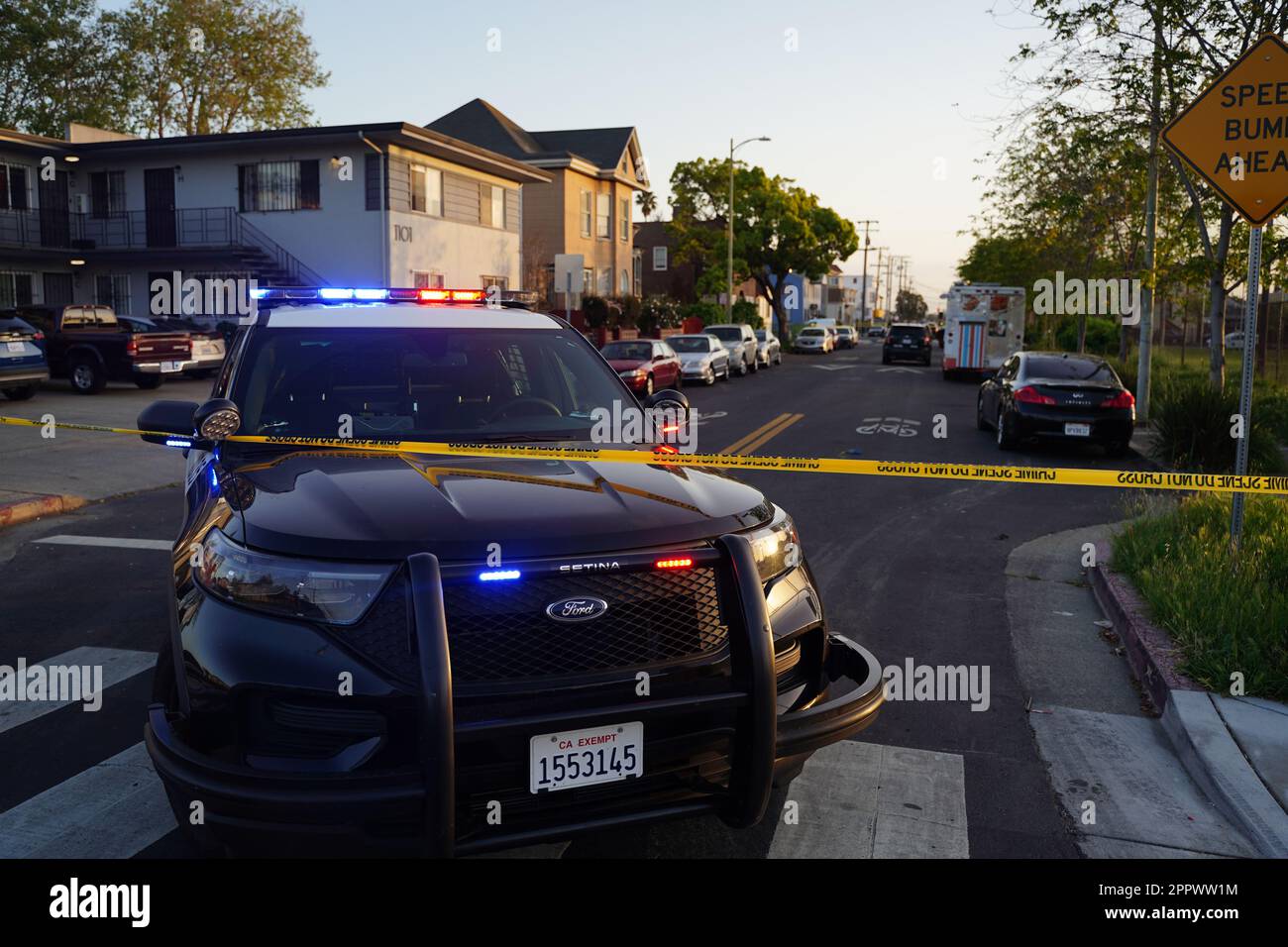 Police officers use a cop vehicle and a cordon line to blockade the ...