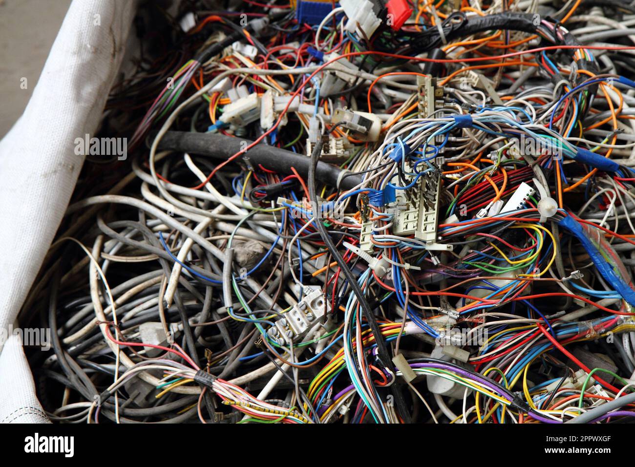 color wires garbage as background from recycle industry Stock Photo - Alamy