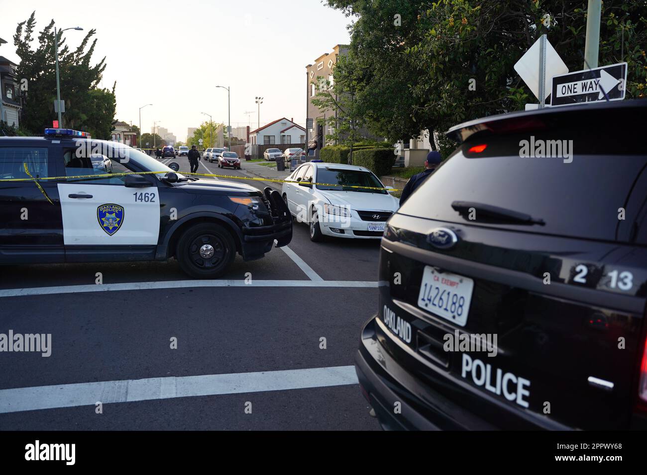 Police officers use a cop vehicle and a cordon line to blockade the ...