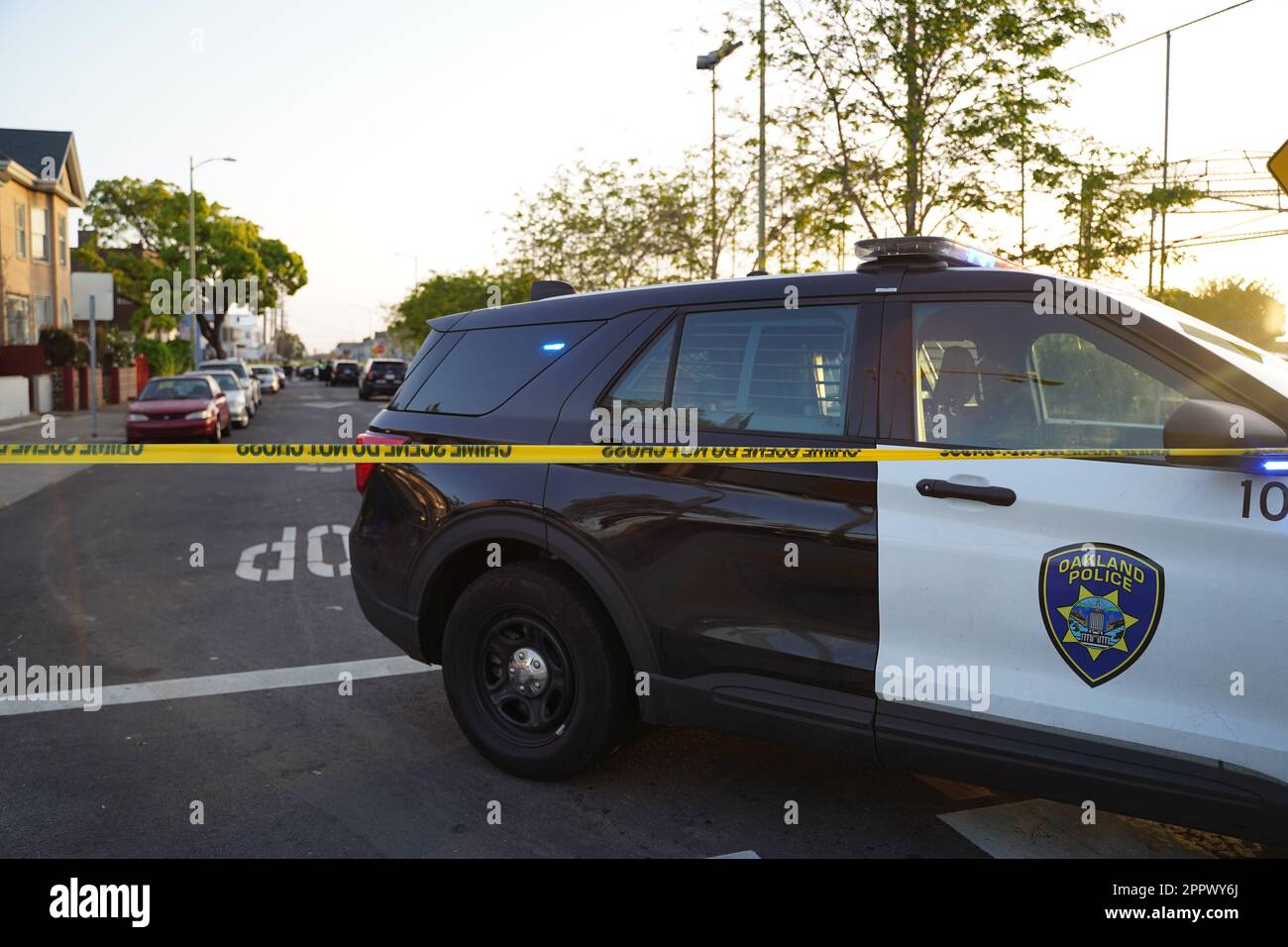Police officers use a cop vehicle and a cordon line to blockade the ...