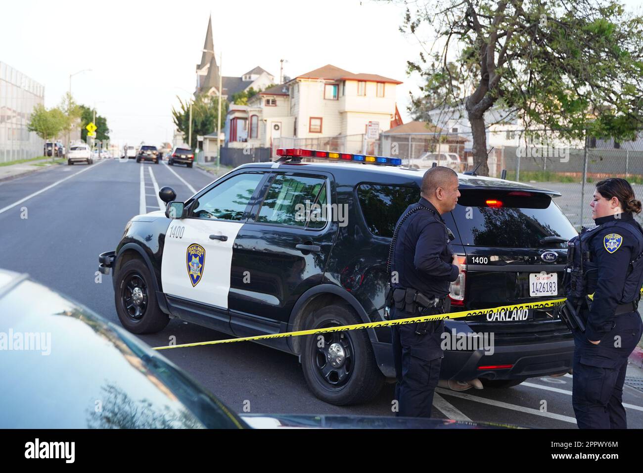 Oakland, United States. 24th Apr, 2023. Police officers use a cop ...