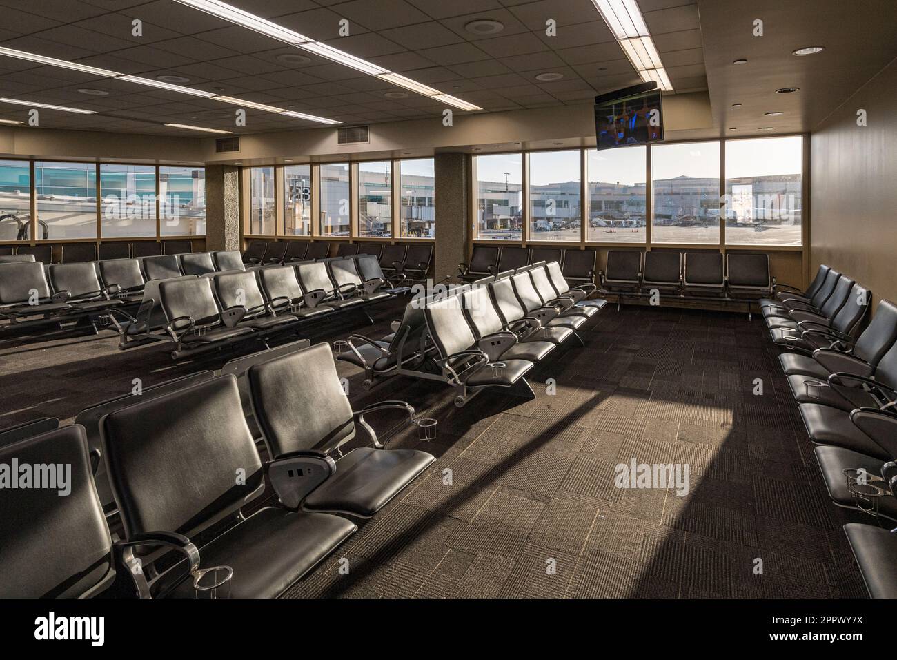 Empty seating area at airport terminal gate nobody San Diego ...
