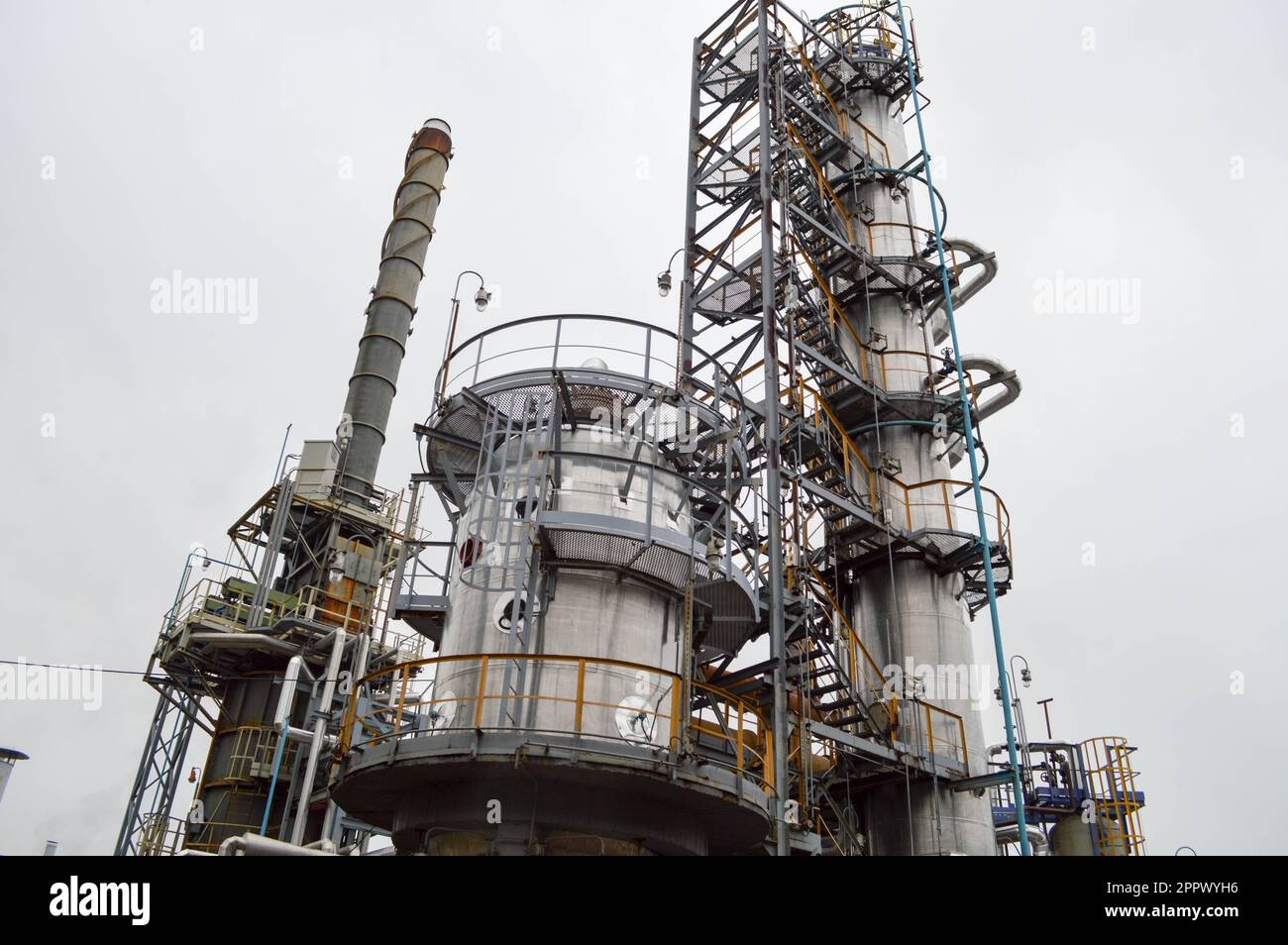 Installation for processing oil with columns and pipes. Refinery Stock ...