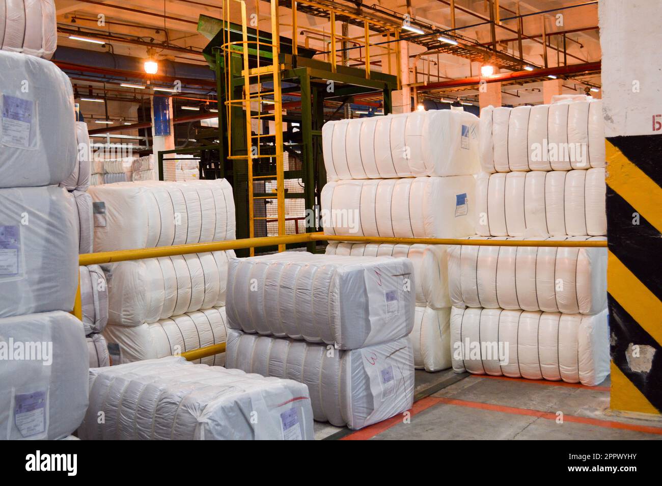 Large white packages, bags with synthetic acrylic fiber in the ...