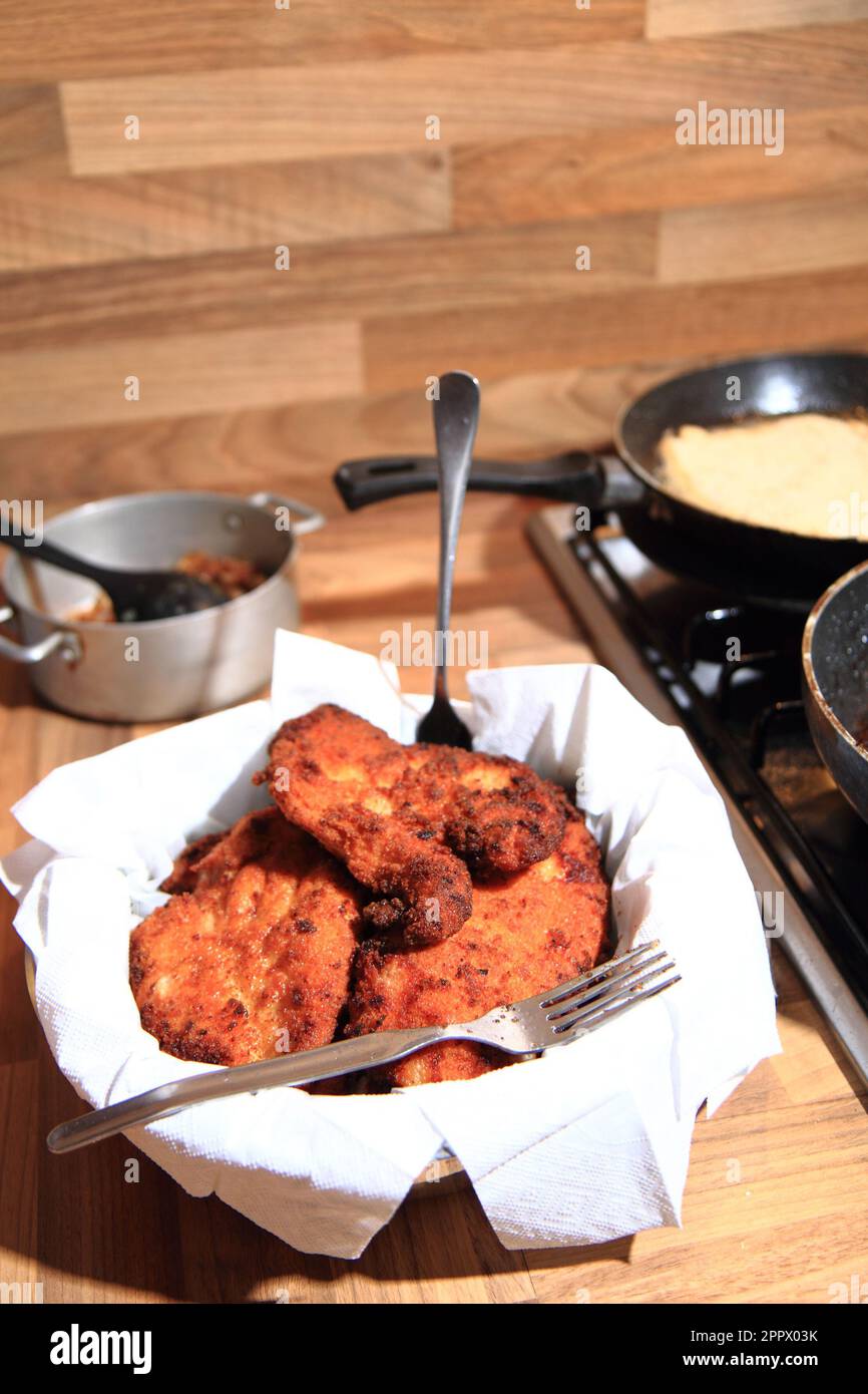 preparing czech chicken schnitzel as nice food background Stock Photo ...