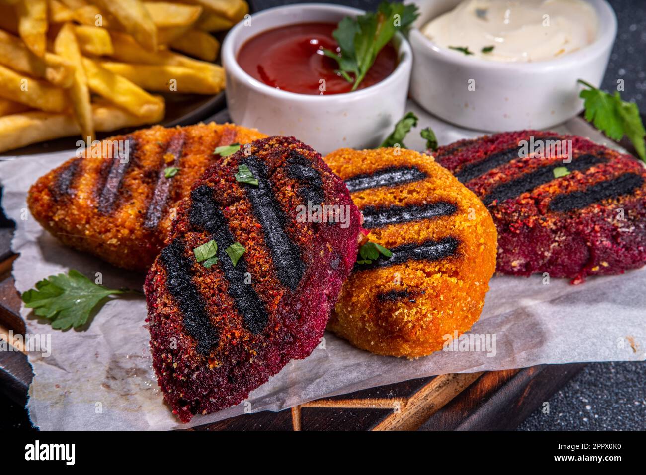 Vegan beetroot carrot cutlets. Vegetable grilled cutlets with ketchup ...