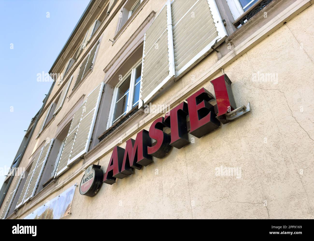 Strasbourg, France - Sep 21, 2022: A vibrant red neon sign illuminates ...