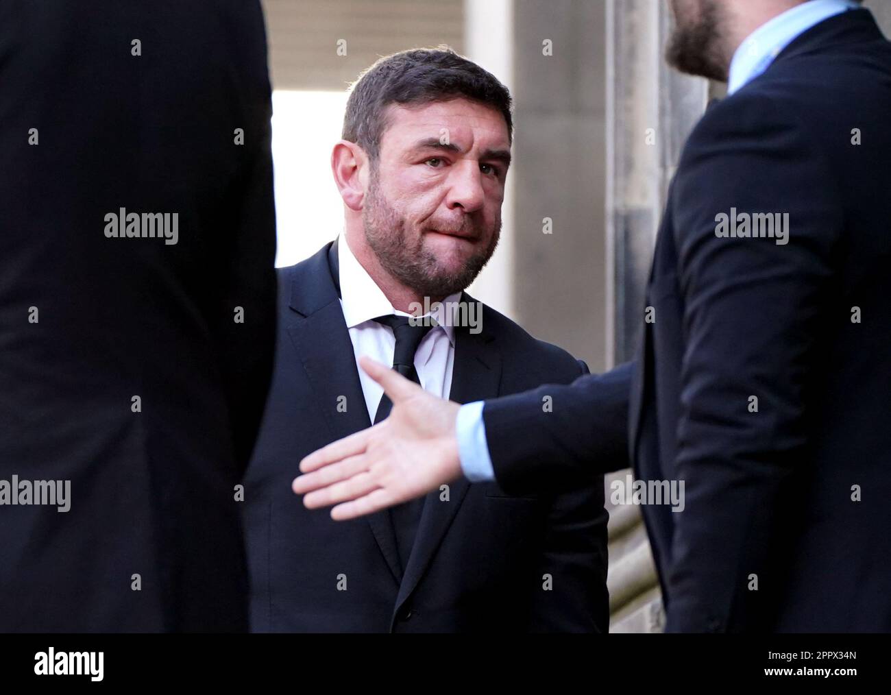 Former boxer Alex Arthur arrives ahead of a memorial service for former ...