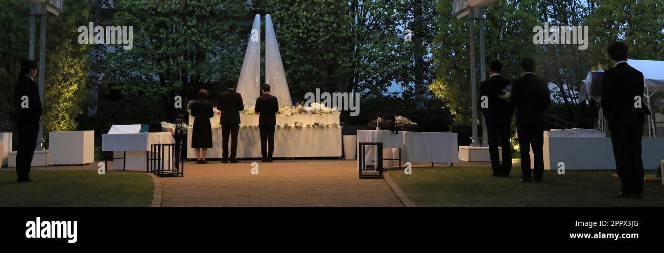 People pray for victims at a memorial facility at the accident site in Amagasaki City, Hyogo ...