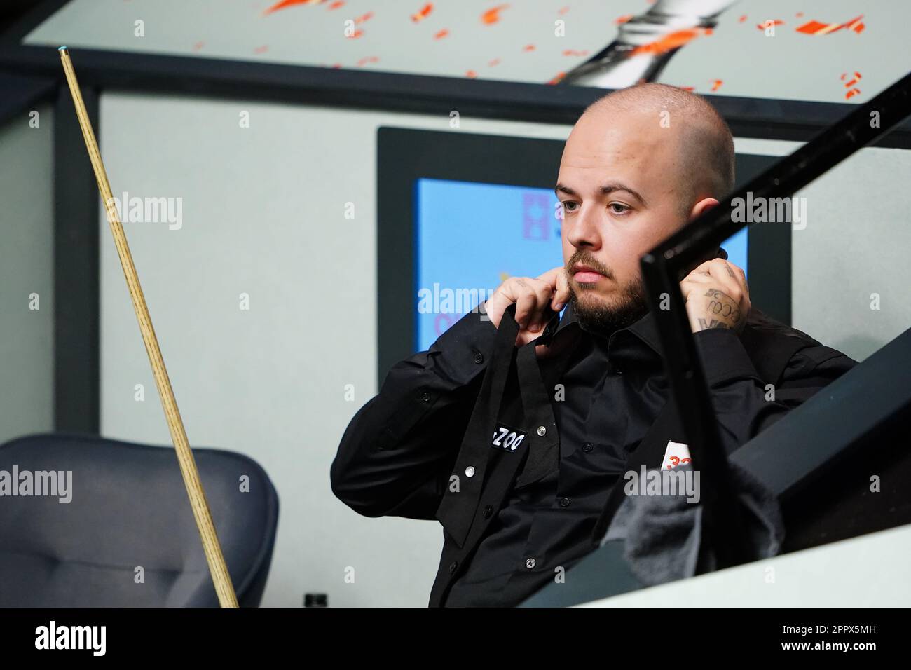 Luca Brecel in action against Ronnie O'Sullivan (not pictured) on day ...