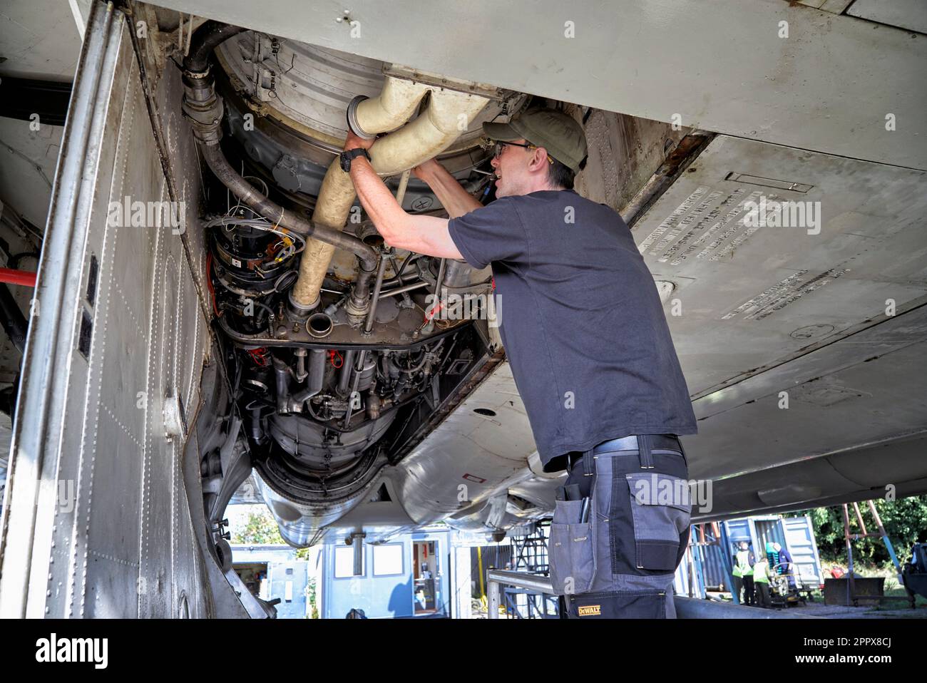 Aircraft engineer working on the Avro Vulcan B2 Bomber airplane; XM655 ...