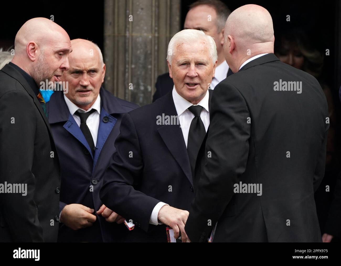 Former boxer Jim Watt with Barry McGuigan following a memorial service ...