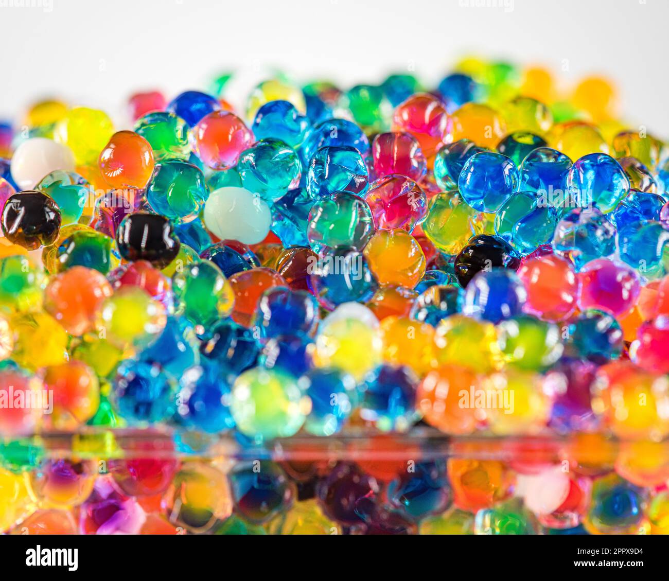 Water beads close-up, abstract background. Texture of Hydrogel balls or ...