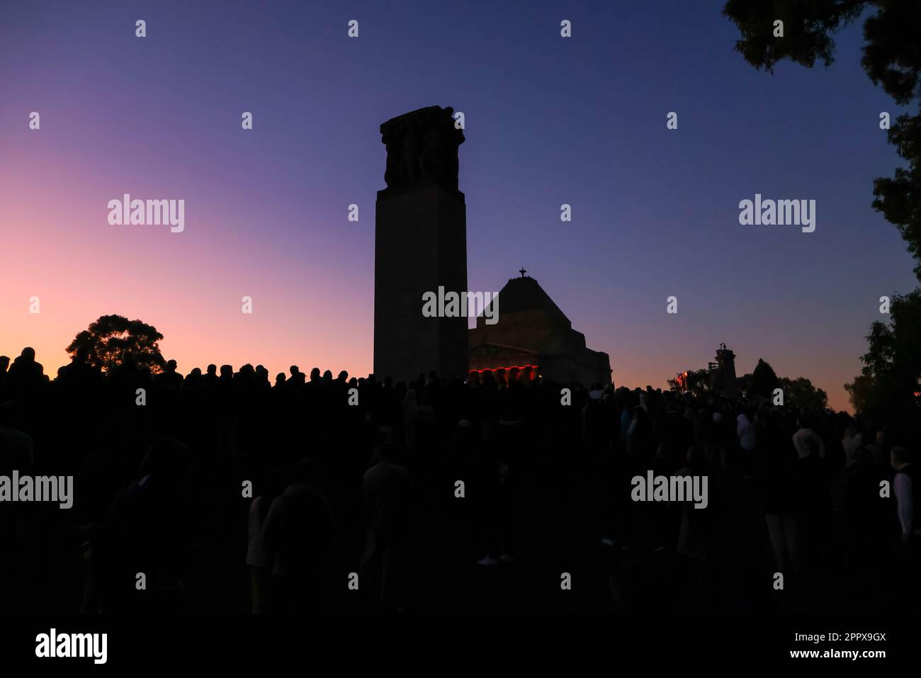 The sun rising during the dawn service at The Shrine of Remembrance ...