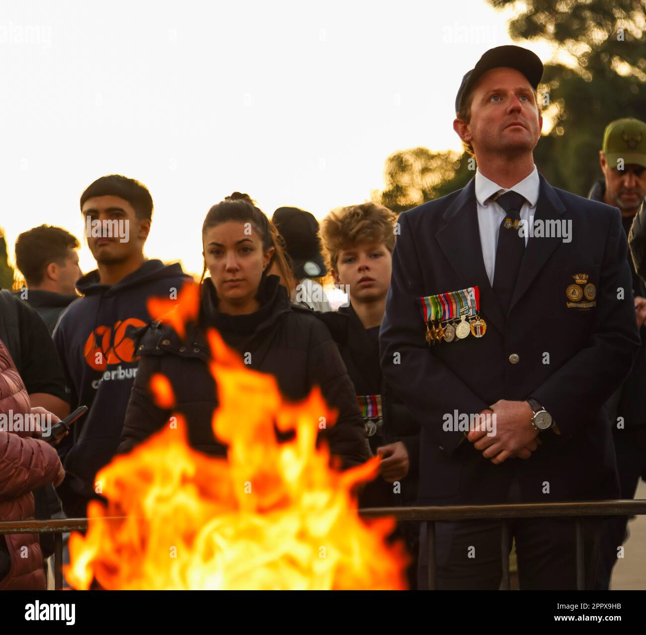 Members of the public stand at the eternal flame while paying their ...