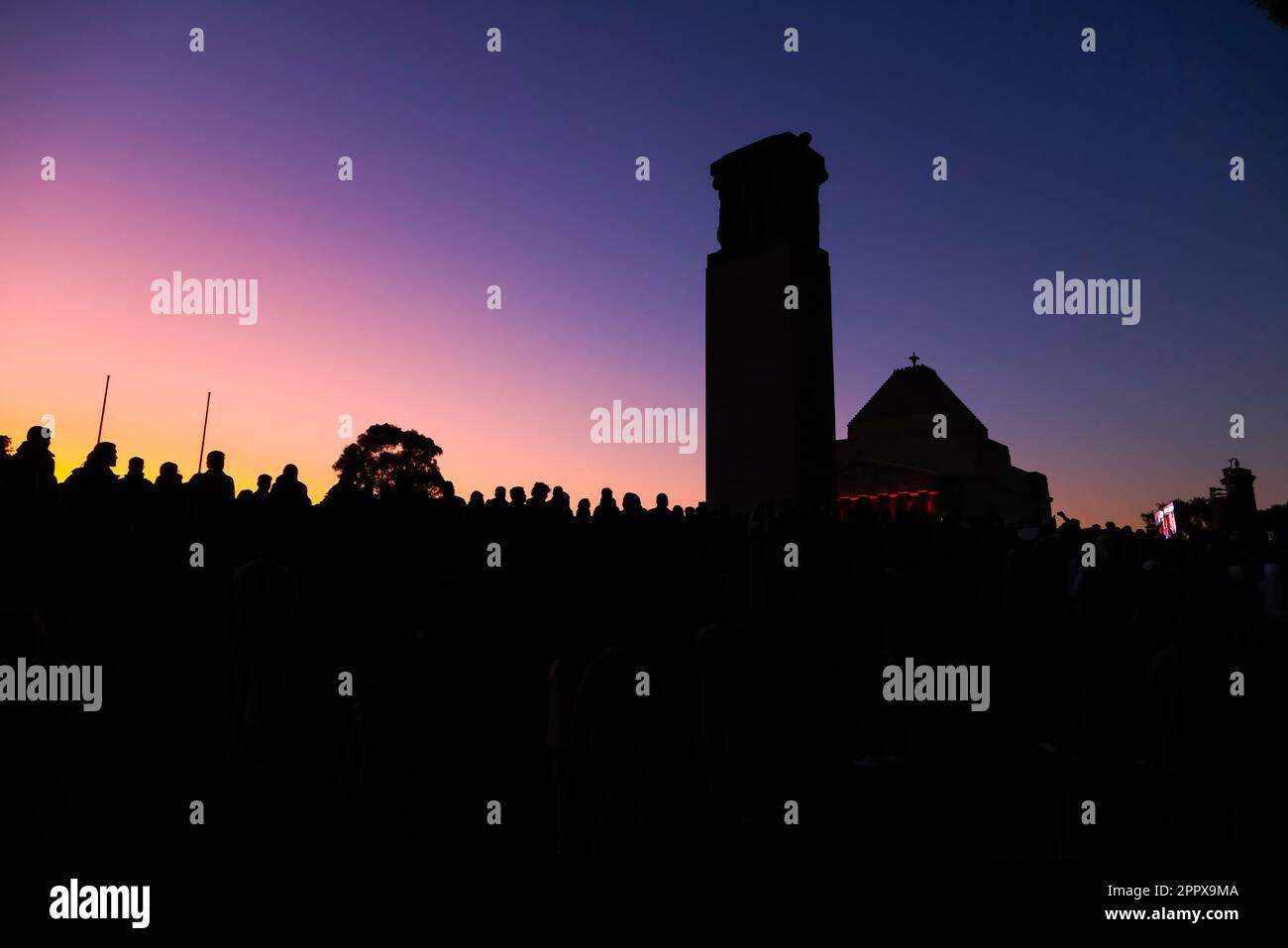 The sun rising during the dawn service at The Shrine of Remembrance ...