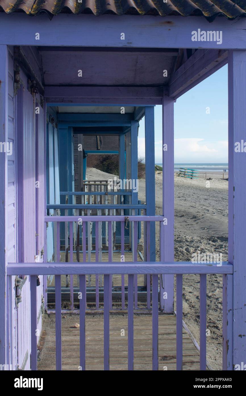 The veranda of a purple beach hut West Wittering, West Sussex, England ...