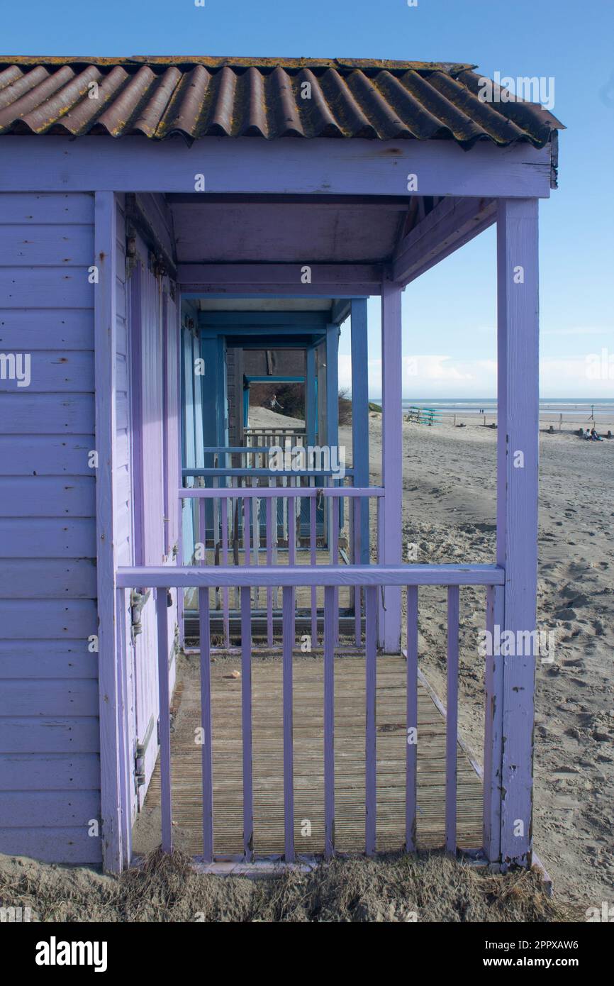 The veranda of a purple beach hut West Wittering, West Sussex, England ...