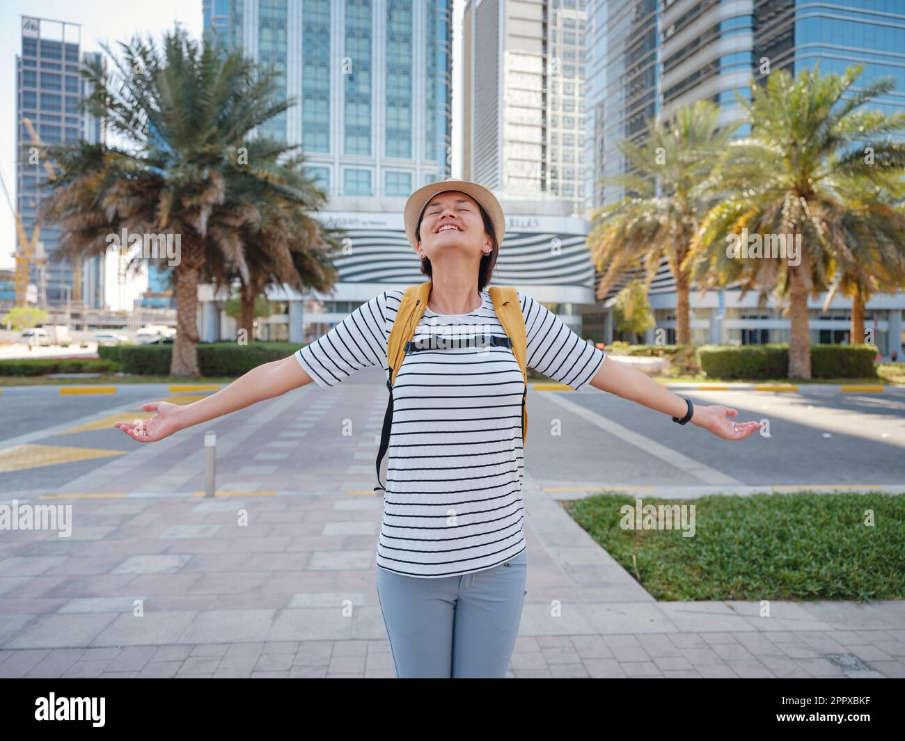 travel to the United Arab Emirates, Happy young asian female traveler ...
