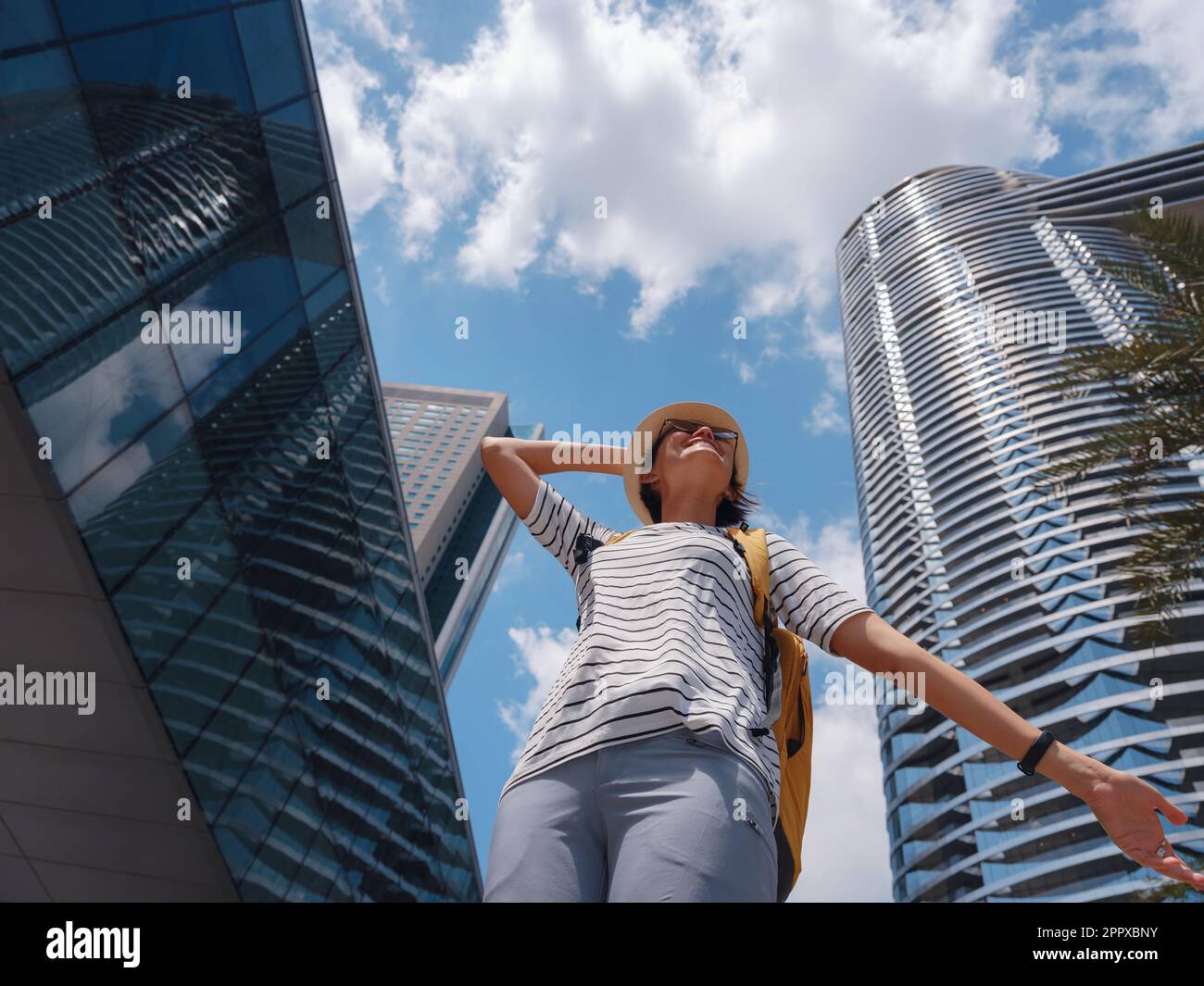 travel to the United Arab Emirates, Happy young asian female traveler ...