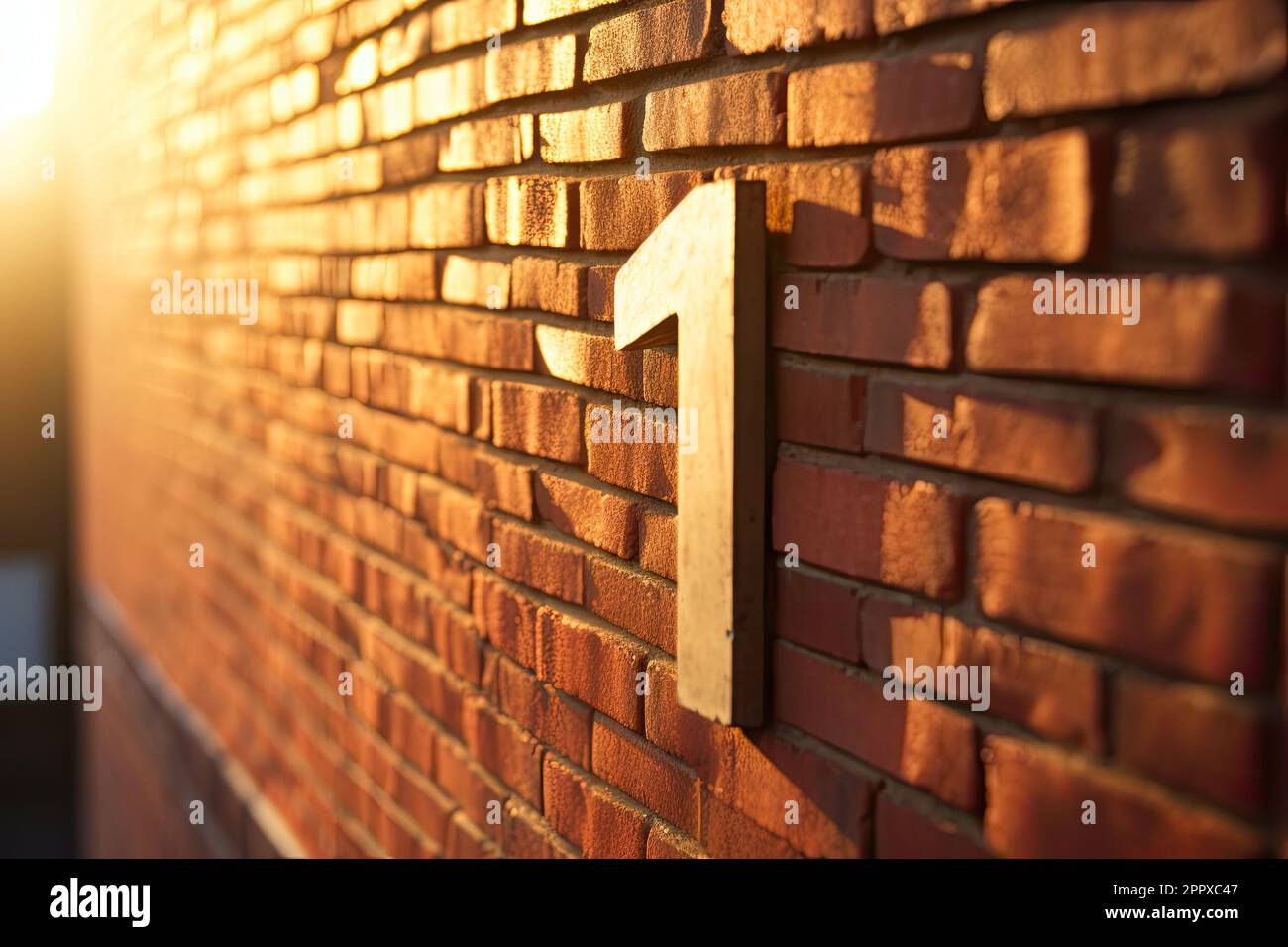 brick wall with a house number one, backlight scene Stock Photo - Alamy