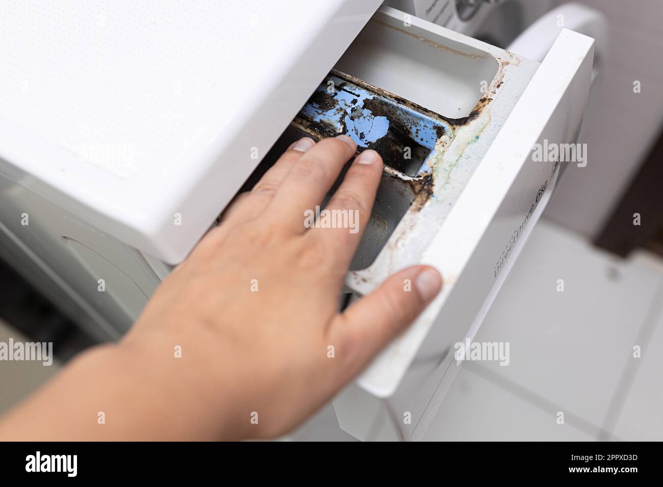 Close up cropped man hand checking and opening dirty, scaled broken ...