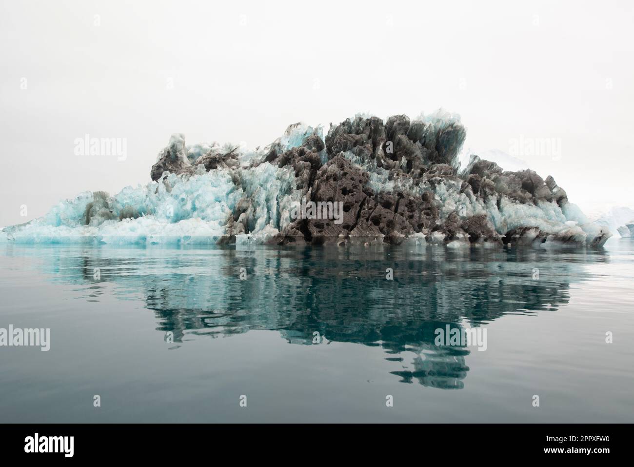 Exposed base of iceberg from base of glacier, Rode Fjord, world's ...