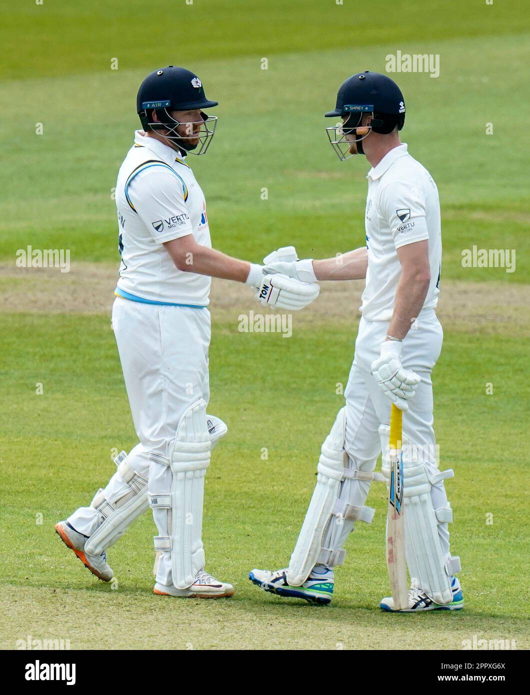 Yorkshire's Finlay Bean (right) is congratulated by Jonny Bairstow ...