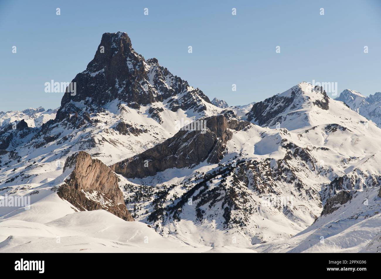 Picturesque landscape of rocky rough mountains covered with snow ...