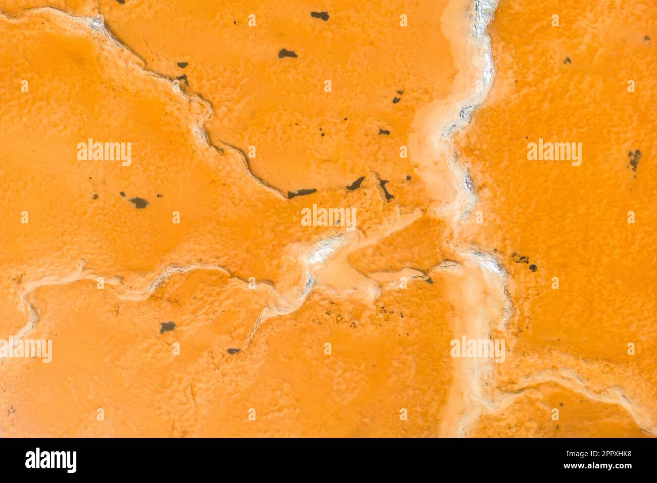 Abstract background from drone of sandy orange colored textured ...