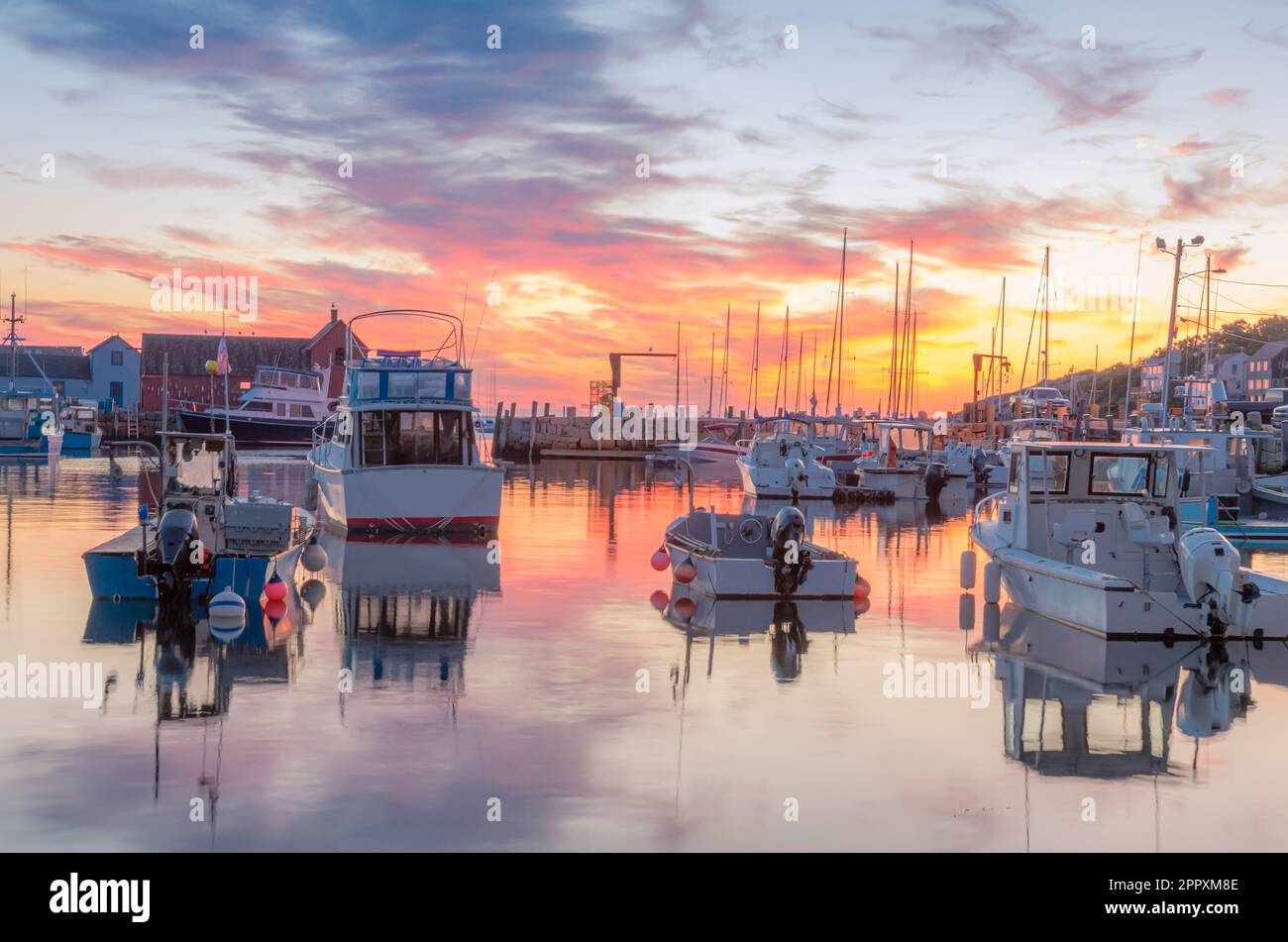 Fishing boats in the harbor of Rockport at sunrise with fishing shack ...