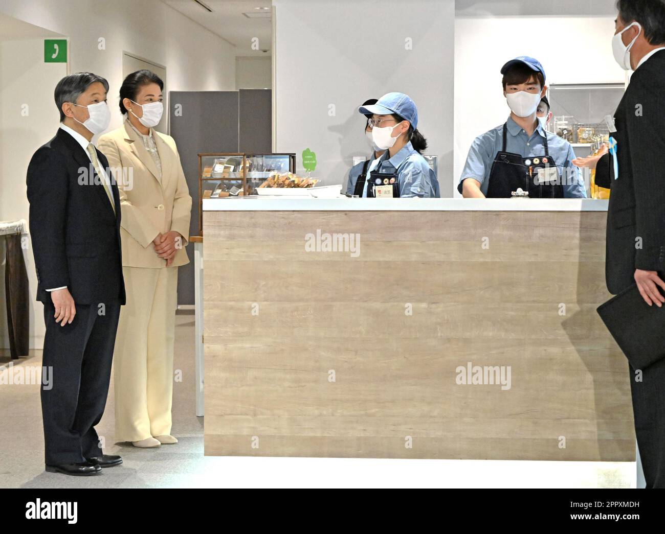 Japanese Emperor Naruhito and Empress Masako visit an office cafe at ...