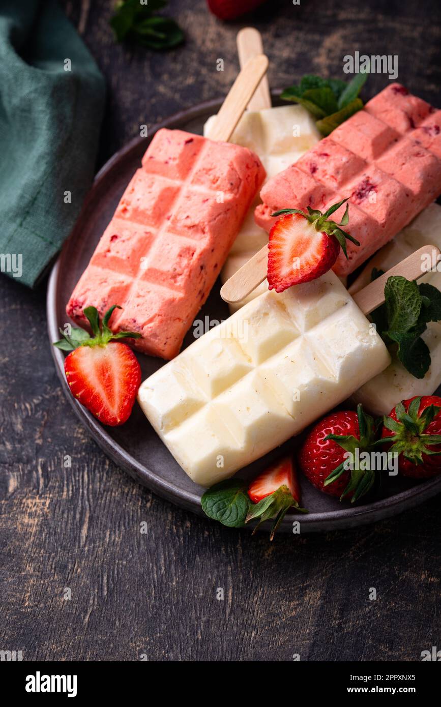 Strawberry ice cream pop sicle with mint Stock Photo - Alamy
