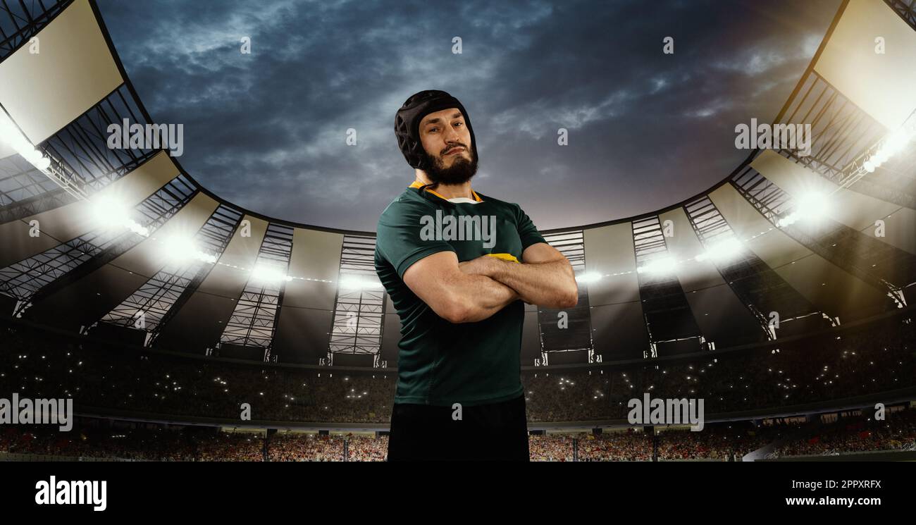 Man, professional rugby player in uniform standing with calm facial ...