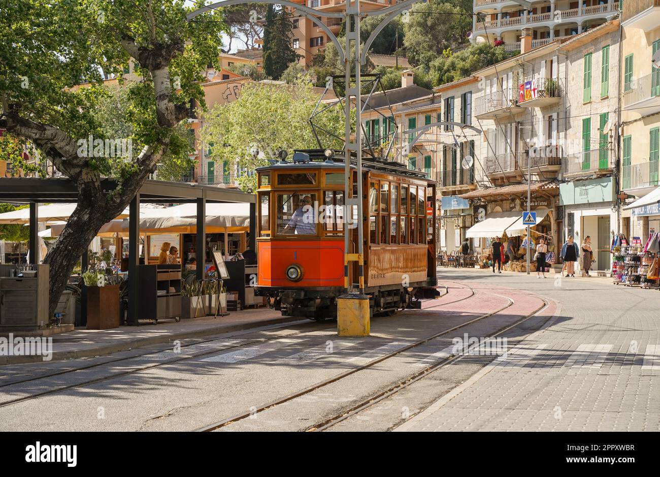 Historic train passing through the village of Puerto Soller, Soller ...