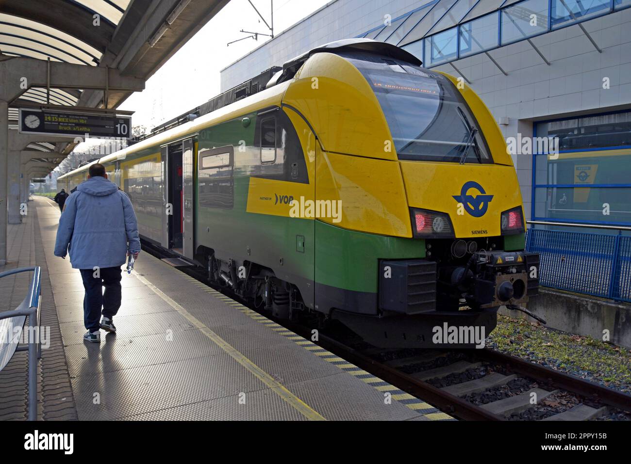 A person catching a Slovak Railways regional train at Bratislava ...