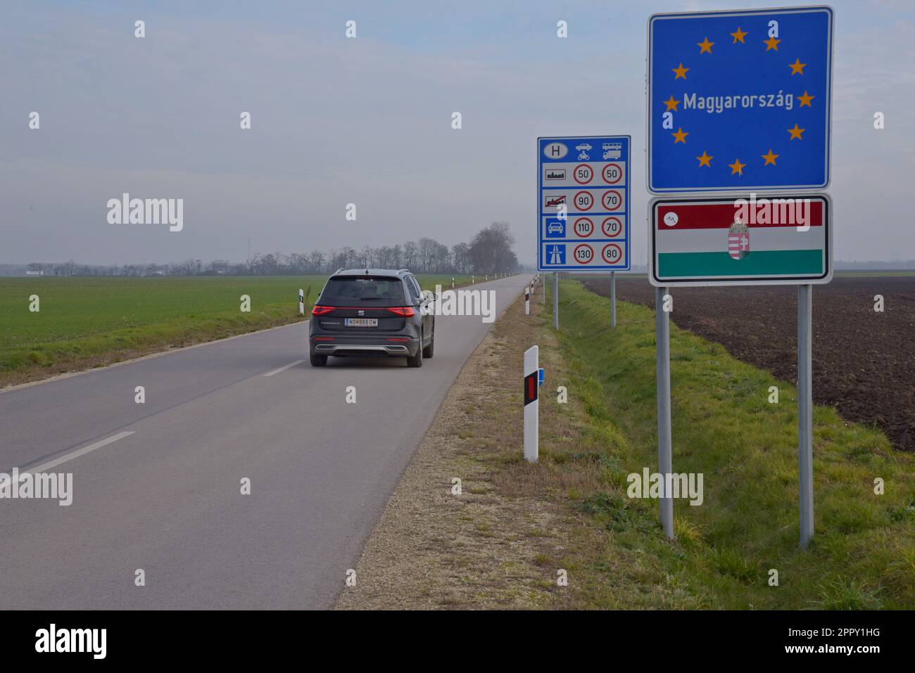 An Austrian car crossing from Austria to Hungary on the Austrian ...