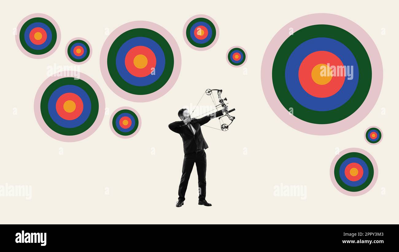 Businessman in formal wear aiming with crossbow on professional target ...